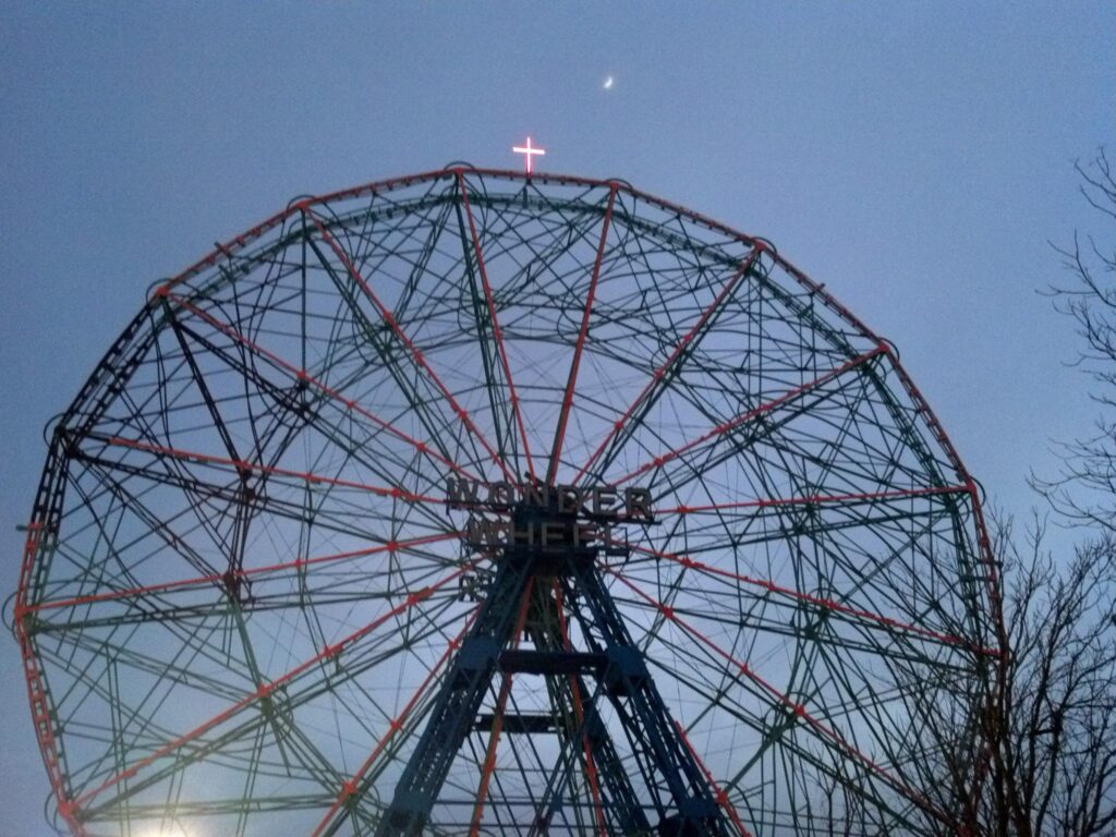 Cross placed atop Wonder Wheel, lights up for different causes and ...